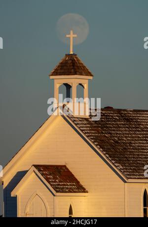 Moon rising over Prairie Country Church Canada Stock Photo - Alamy