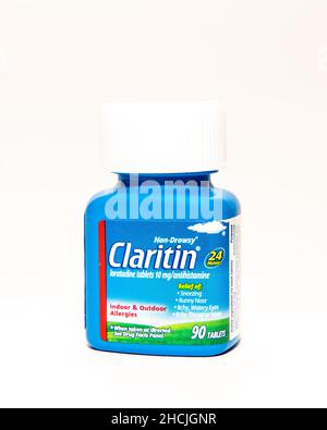 A blue bottle of 90 Claritin, loratadine tablets a non drowsy ...