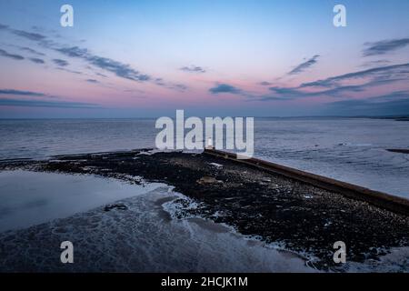 A Lighthouse and Breakwater at the Mouth of a Berwick Upon Tweed Stock ...