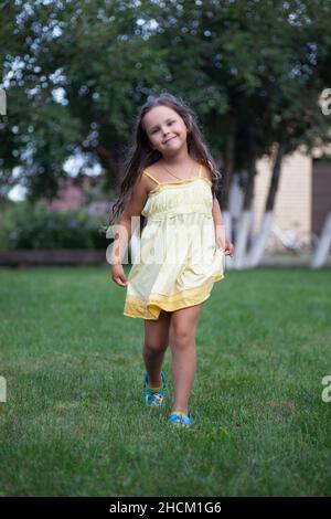 Little girl running around wearing only a diaper Stock Photo - Alamy