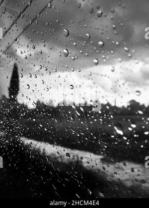 A closeup shot of raindrops on the window on a rainy weather Stock ...