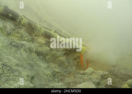 Ceramic pipes used for sulfur mining inside the crater of Kawah Ijen ...