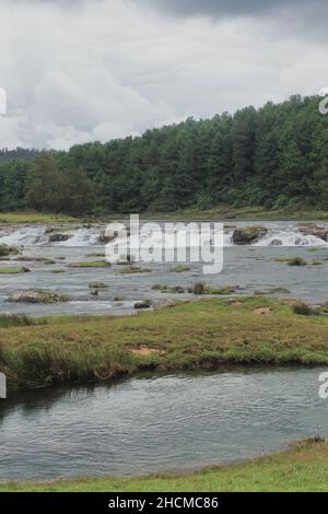 pykara river and waterfalls on the foothills of nilgiri mountains near ...