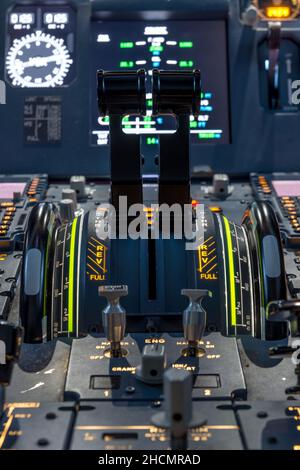 Engine thrust levers. Modern jet aircraft, cockpit Stock Photo - Alamy