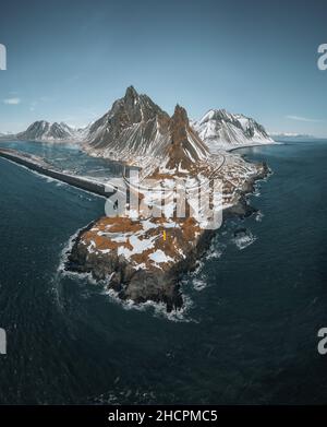 Drone view of a snow covered Eystrahorn mountain in Iceland at Hvalnes ...