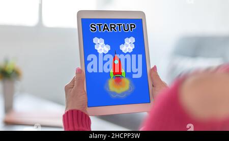 Tablet screen displaying a start up concept Stock Photo - Alamy
