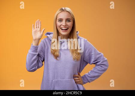 Friendly energized helpful charming female student say hello newcomers ...