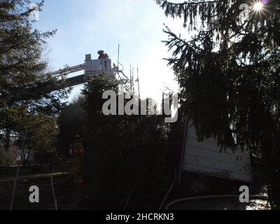 Aftermath of house fire, overhaul operations Stock Photo - Alamy