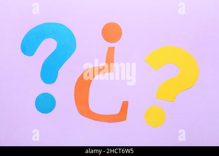 Question marks made of paper on color background Stock Photo - Alamy
