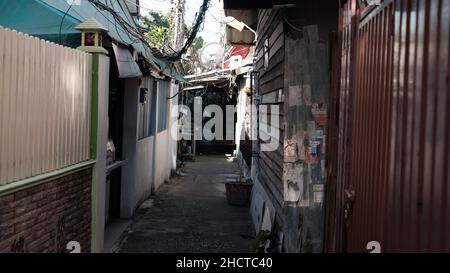 Typical unseengreen Back Alley in Bangkok Thailand Stock Photo - Alamy