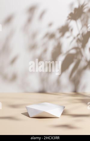 scene with polygonal podium on beige background and shadows Stock Photo ...