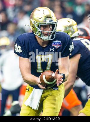 Notre Dame quarterback Jack Coan runs a drill during the NFL football ...
