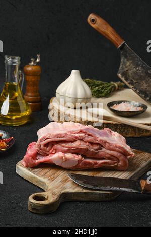 Veal beef Short Ribs, raw sparerib on marble board Isolated on white ...