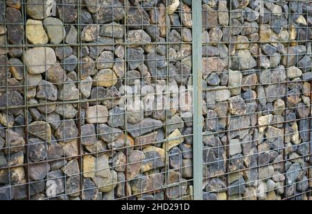 Close up of a gabion as a modern and high-quality visual protection and ...