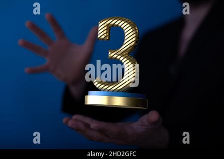 3D rendering of the 3rd award in hand Stock Photo - Alamy