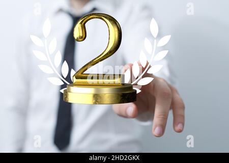 3D rendering of 2nd award in hand Stock Photo - Alamy