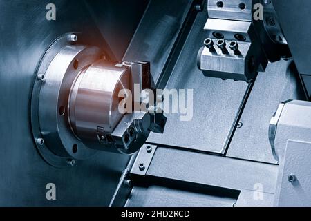 Manufacturing CNC professional lathe machine. Industrial concept. Close ...