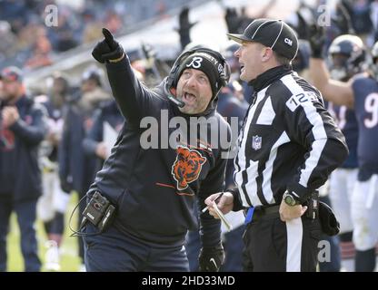 Side judge Chad Hill (125) waches an NFL football game between the Los ...