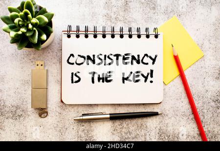 Writing displaying text Consistency Is The Key. Business idea by ...