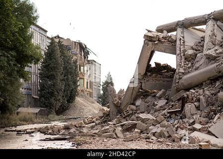 Collapsed concrete industrial building isolated on white. Disaster ...