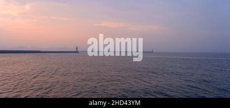 Scenic view of the port of Dalian on bright sunset sky background Stock ...