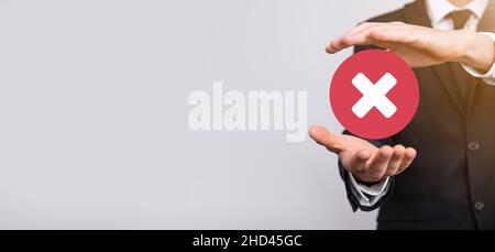 Hand holds icon,cancellation symbol,cancel icon.Cross mark flat red ...