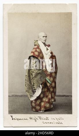 The high priest in his robes. Print shows a priest, full-length ...