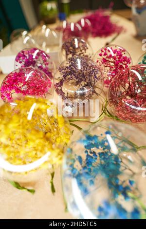 Florist at work: how to make glass sphere with flowers inside Stock ...