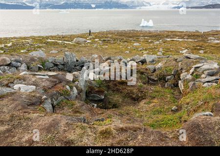 Rock and turf winter house of the Thule culture with underground ...