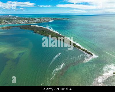 Aerial view of Bribie Island divided in two by huge king tide in ...