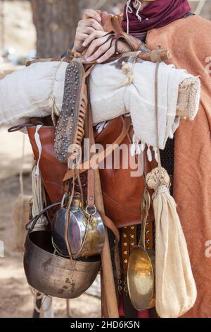Roman living history reenactor holds a flaming torch during the ...
