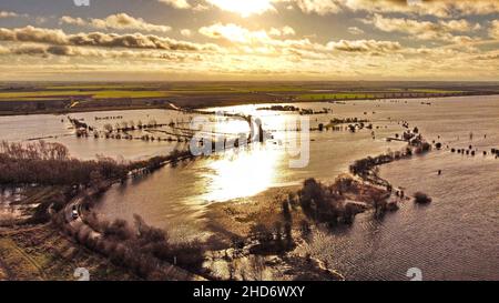 Welney, UK. 31st Dec, 2021. The Welney wash area is beginning to fill ...