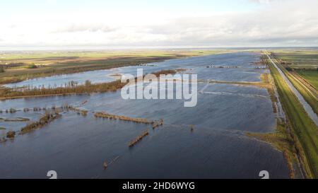 Welney, UK. 31st Dec, 2021. The Welney wash area is beginning to fill ...
