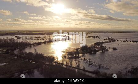 Welney, UK. 31st Dec, 2021. The Welney wash area is beginning to fill ...