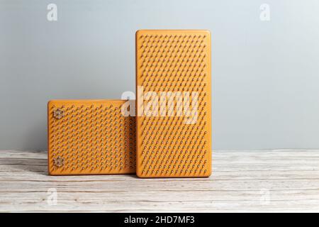 Sadhu board on wood background. The practice of standing on nails. Yoga ...