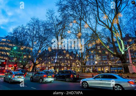 Sloane Square, a memorial city park decorated with Christmas lights ...