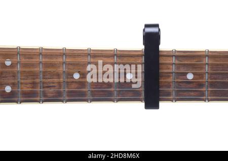 Capo on the Acoustic guitar neck , capro made from aluminium, Selective ...