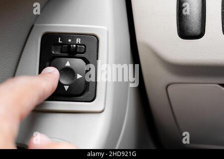 Side mirror control button for adjusting the side mirrors in the proper ...