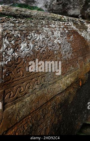 Weathered coffins (erong) in the 700 yr old burial cave at Lombock ...