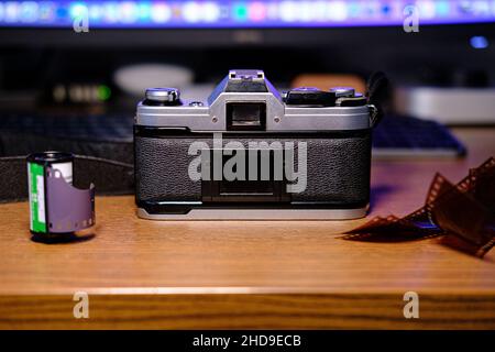 vintage camera, negative films, lenses and frame on grunge wooden ...