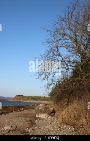 Beach of Morecambe bay at Hest Bank with the tide out and the mud beach ...
