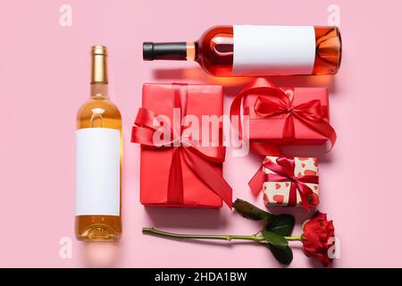 Composition with bottles of wine, rose flower and chocolate candies on ...