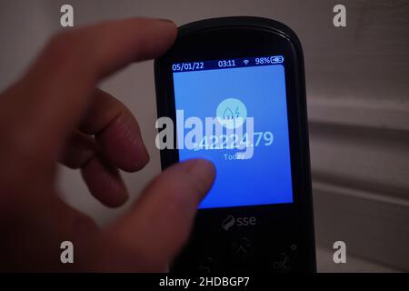 A handheld SSE smart meter for electricty and gas showing a faulty ...