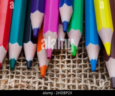 Colored pencils on neutral background with copy space Stock Photo - Alamy