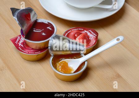 Jam in portion pack with spoon, jam Stock Photo - Alamy