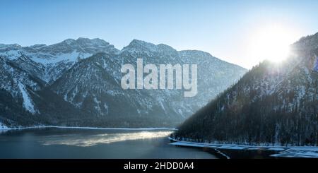 Lake Plansee and mountain background on a sunny autumn day in the ...