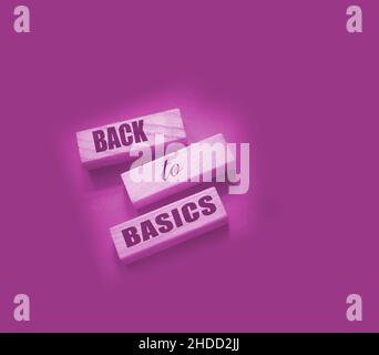 The words back to basics made of letters on wooden blocks. back to ...