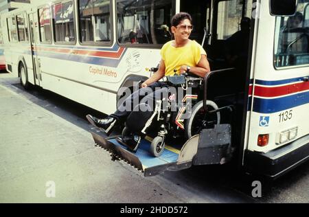 Austin Texas USA, 1990: Handicapped wheelchair athlete crosses finish ...