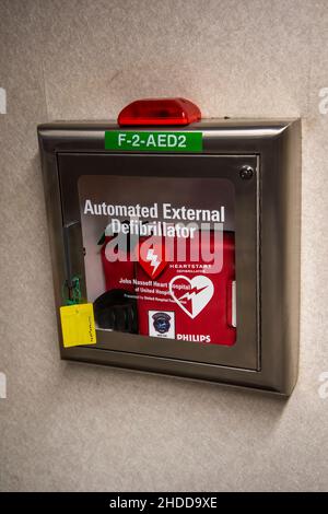AED automated external defibrillator device on wall chest paddles ...