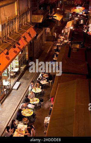 Diners at dai pai dong outdoor eateries on Stanley Street, Hong Kong ...
